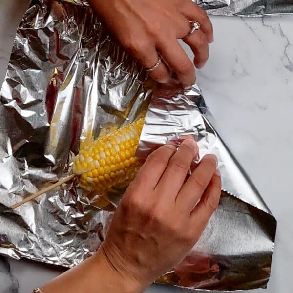Easy Oven Baked Pecorino Basil Pesto Corn on the Cob - Just Maika Cooking